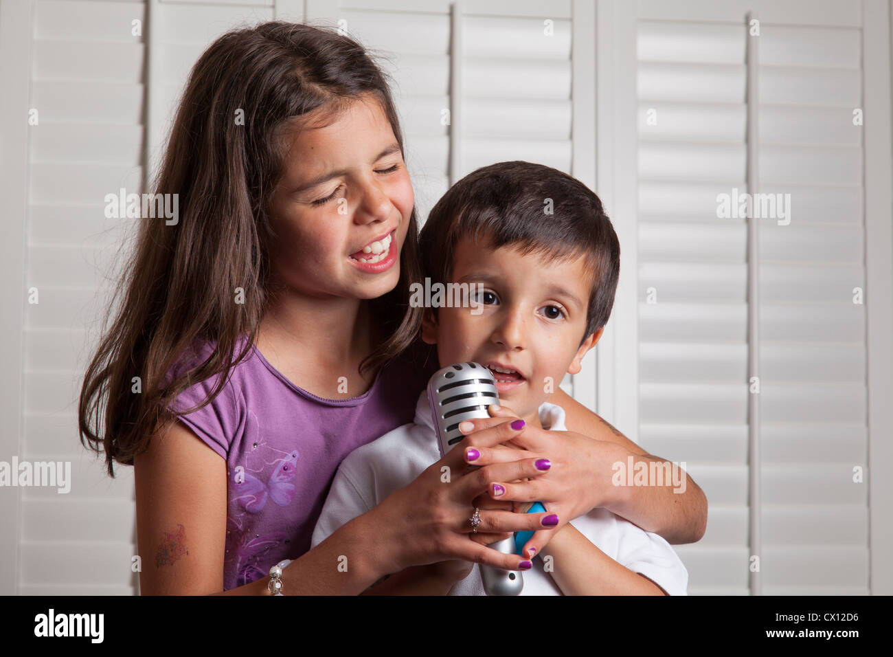 Singing Siblings High Resolution Stock Photography and Images - Alamy