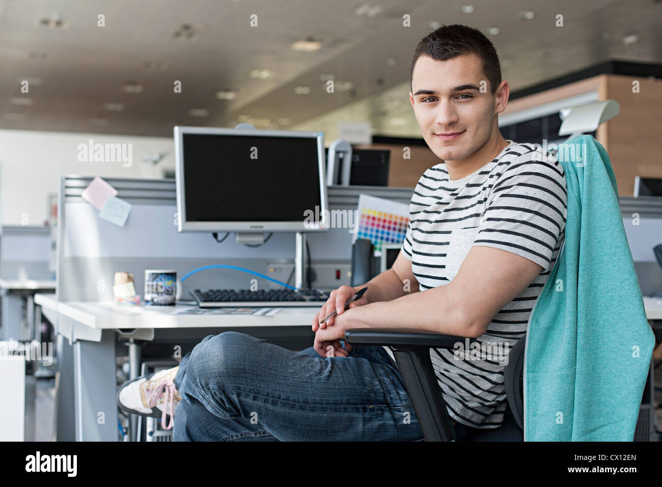 Portrait of man at desk Stock Photo - Alamy