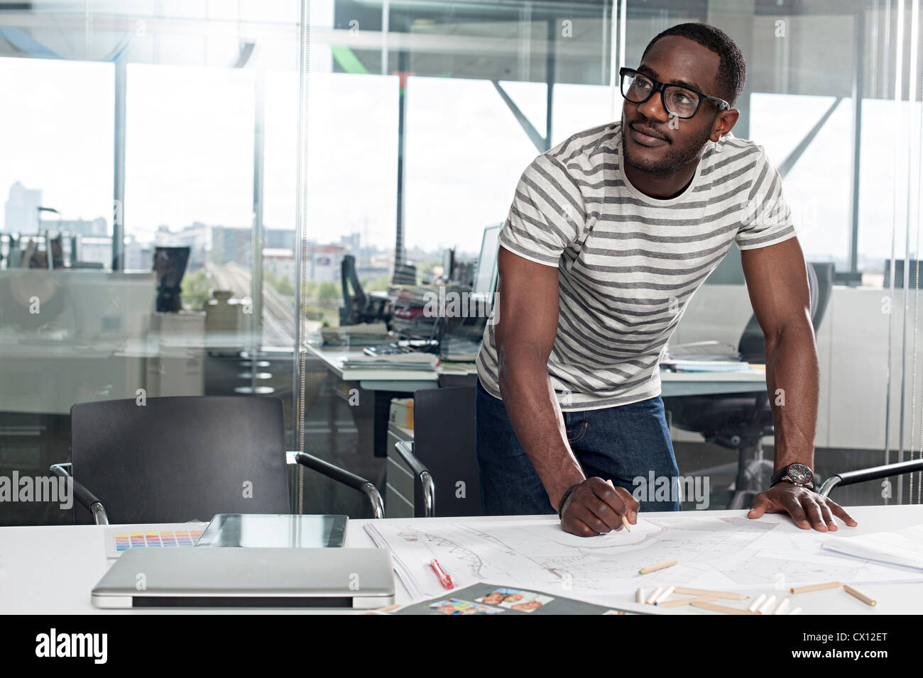 Man planning in office Stock Photo - Alamy