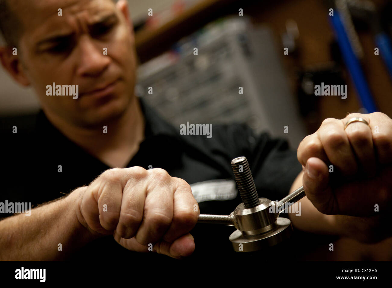 Tightening bolt hi-res stock photography and images - Alamy