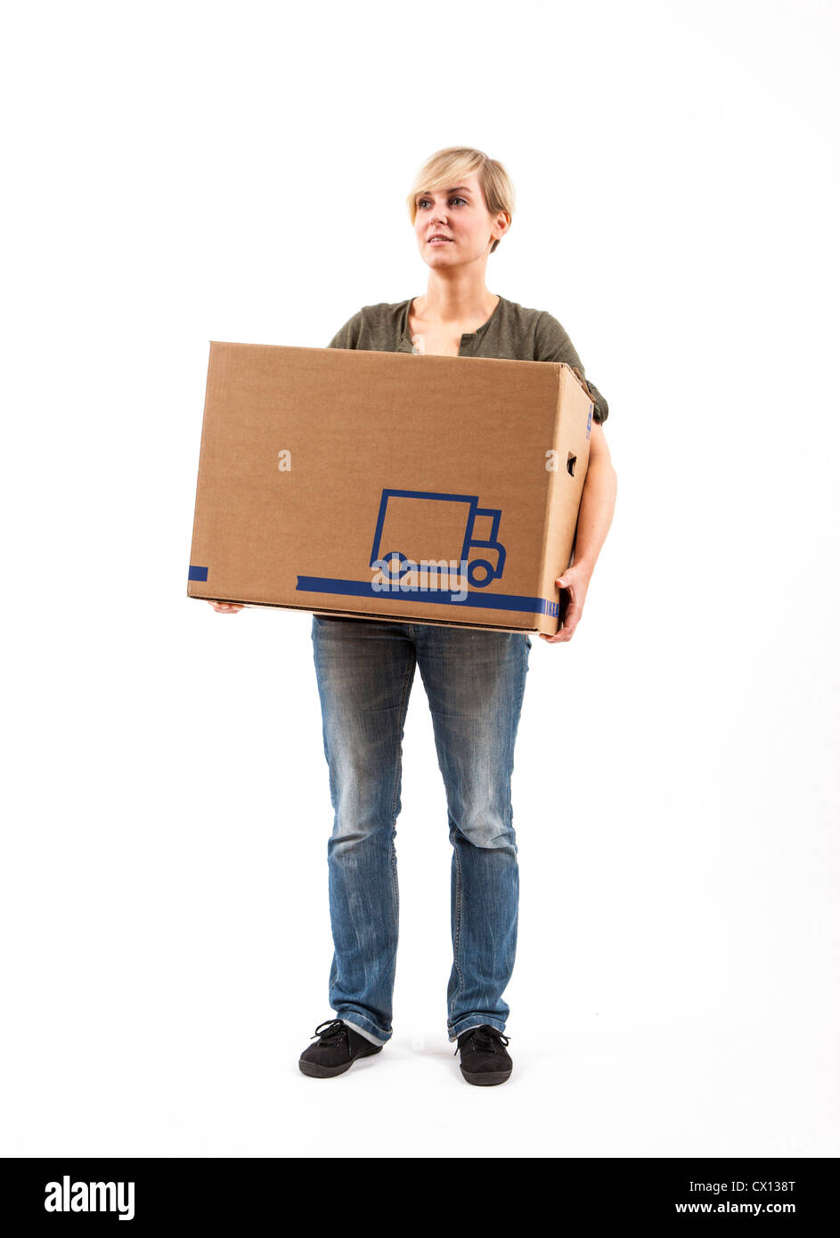 Moving, symbol image. Woman is carrying moving boxes Stock Photo - Alamy