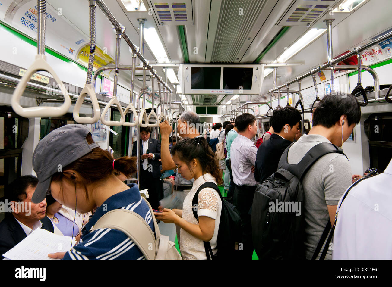 Passengers on subway train, Seoul, Korea Stock Photo - Alamy