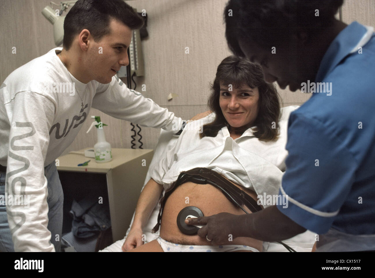 midwife monitoring unborn baby heartbeat Stock Photo - Alamy