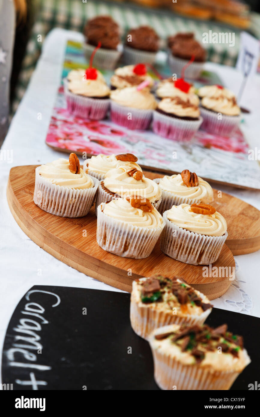 A display of cup cakes at a local farmers market Stock Photo - Alamy