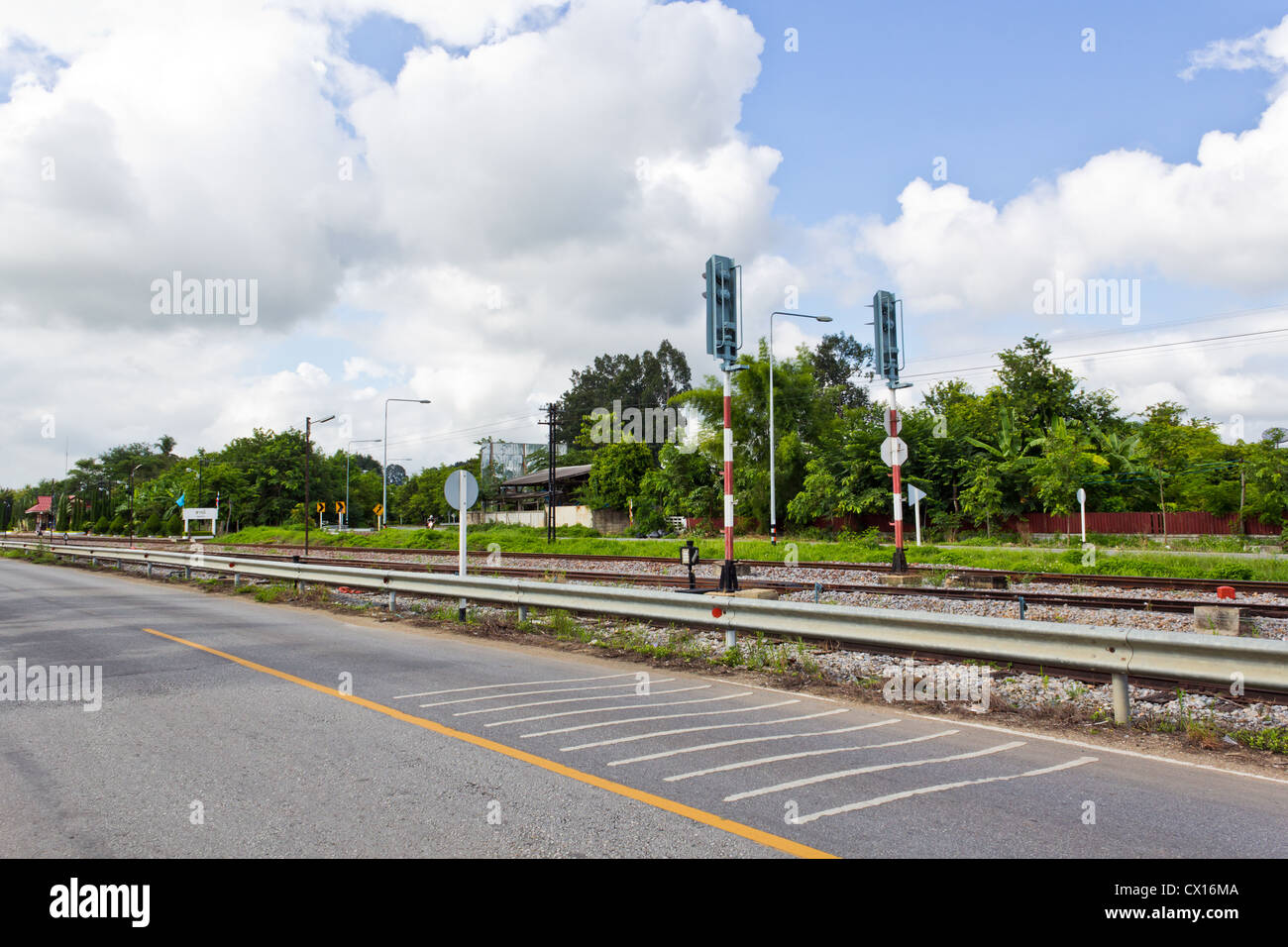 Railway is parallel to the Road Stock Photo - Alamy