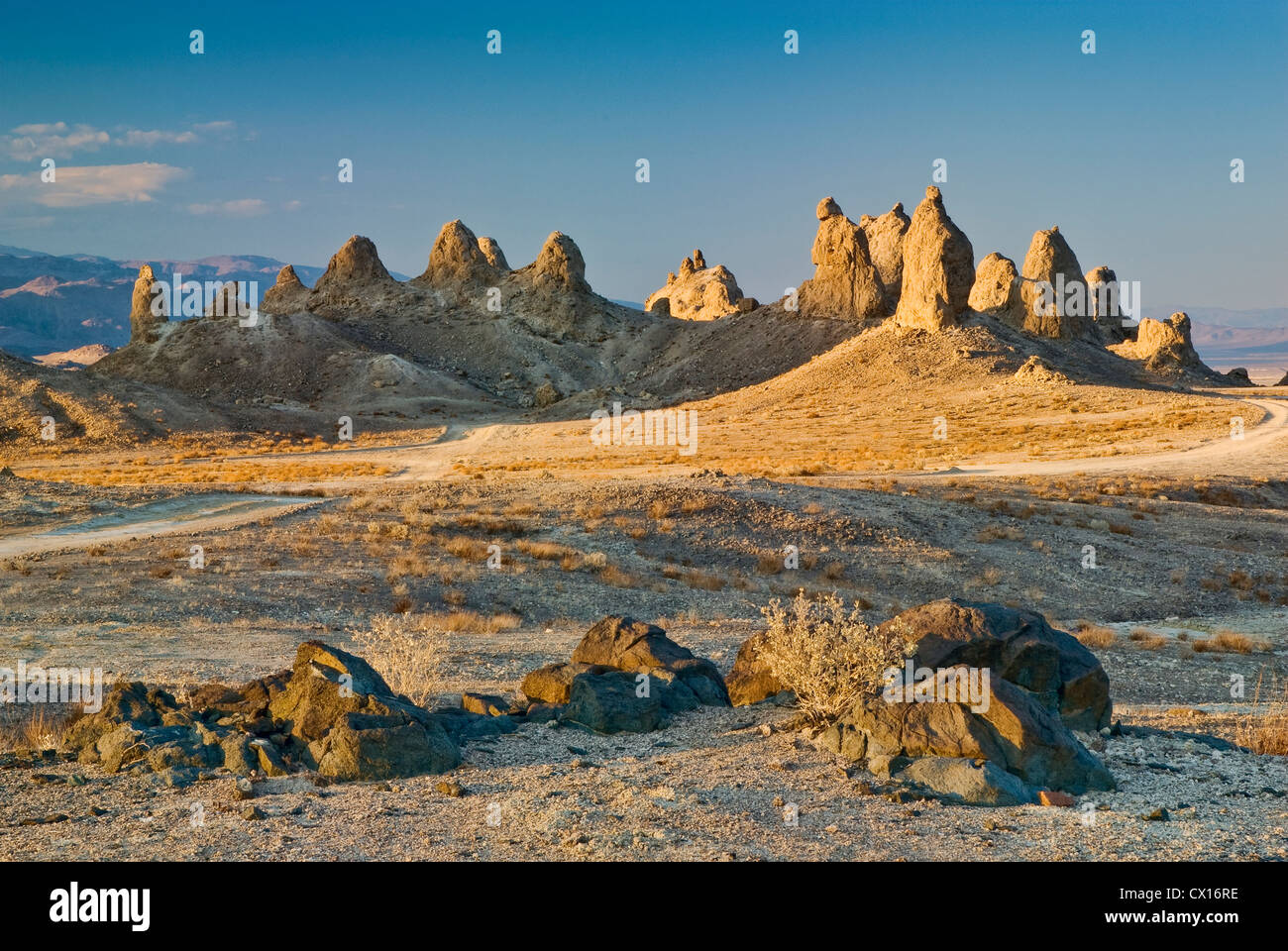 Tufa spires and chunks of basalt at sunset, Trona Pinnacles National ...