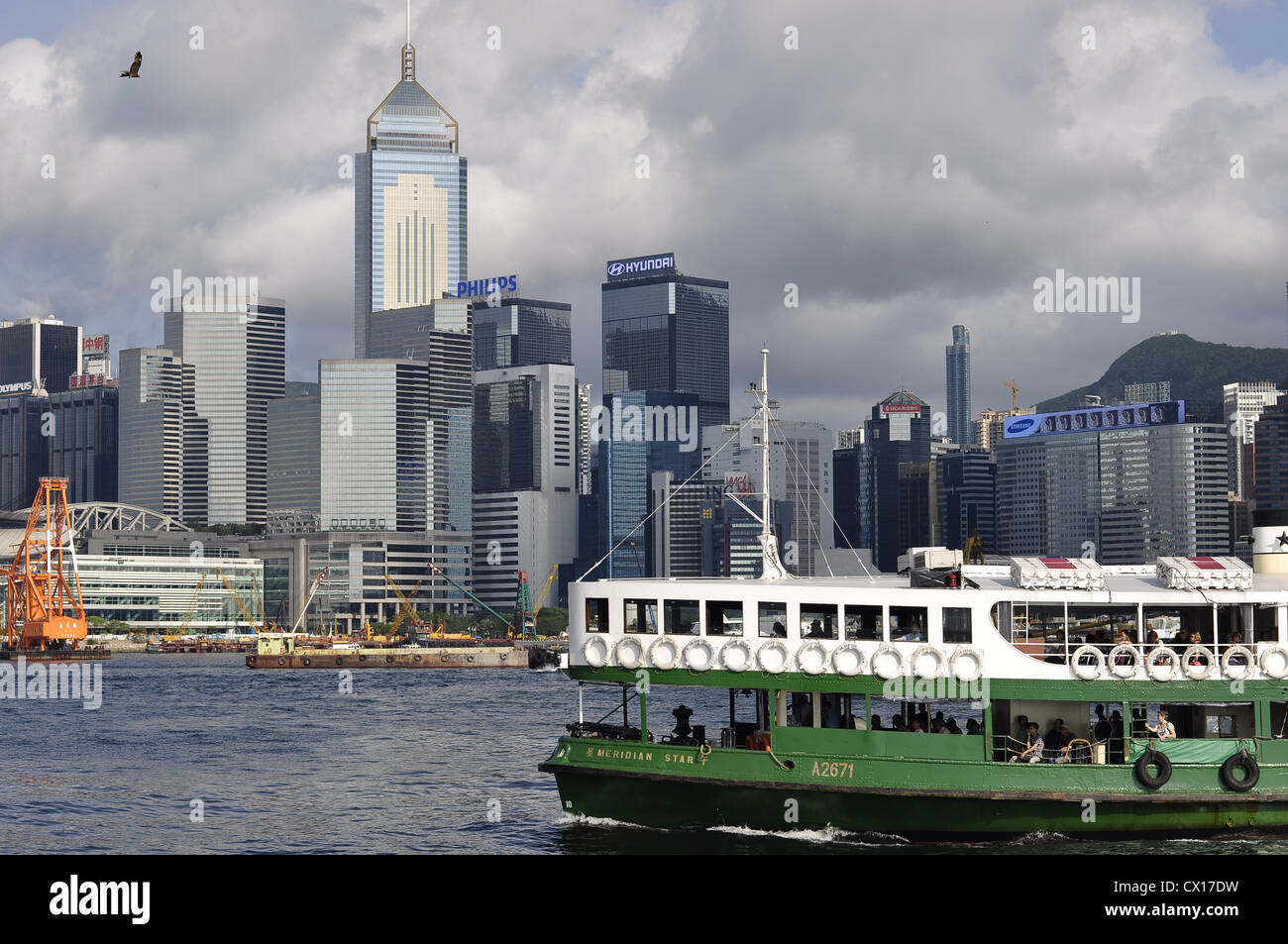 Star Ferry boat with the skyline of Hong Kong in the background (Hong ...