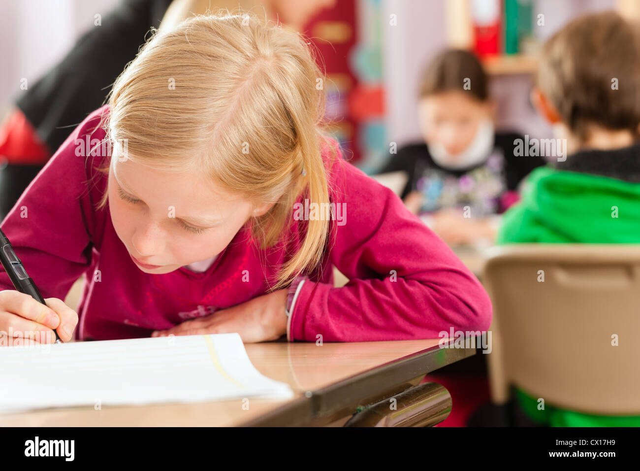 Education - Pupils and teacher learning at elementary or primary school ...