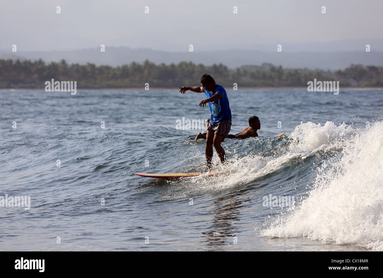 Skilled surfer on large waves hi-res stock photography and images - Alamy