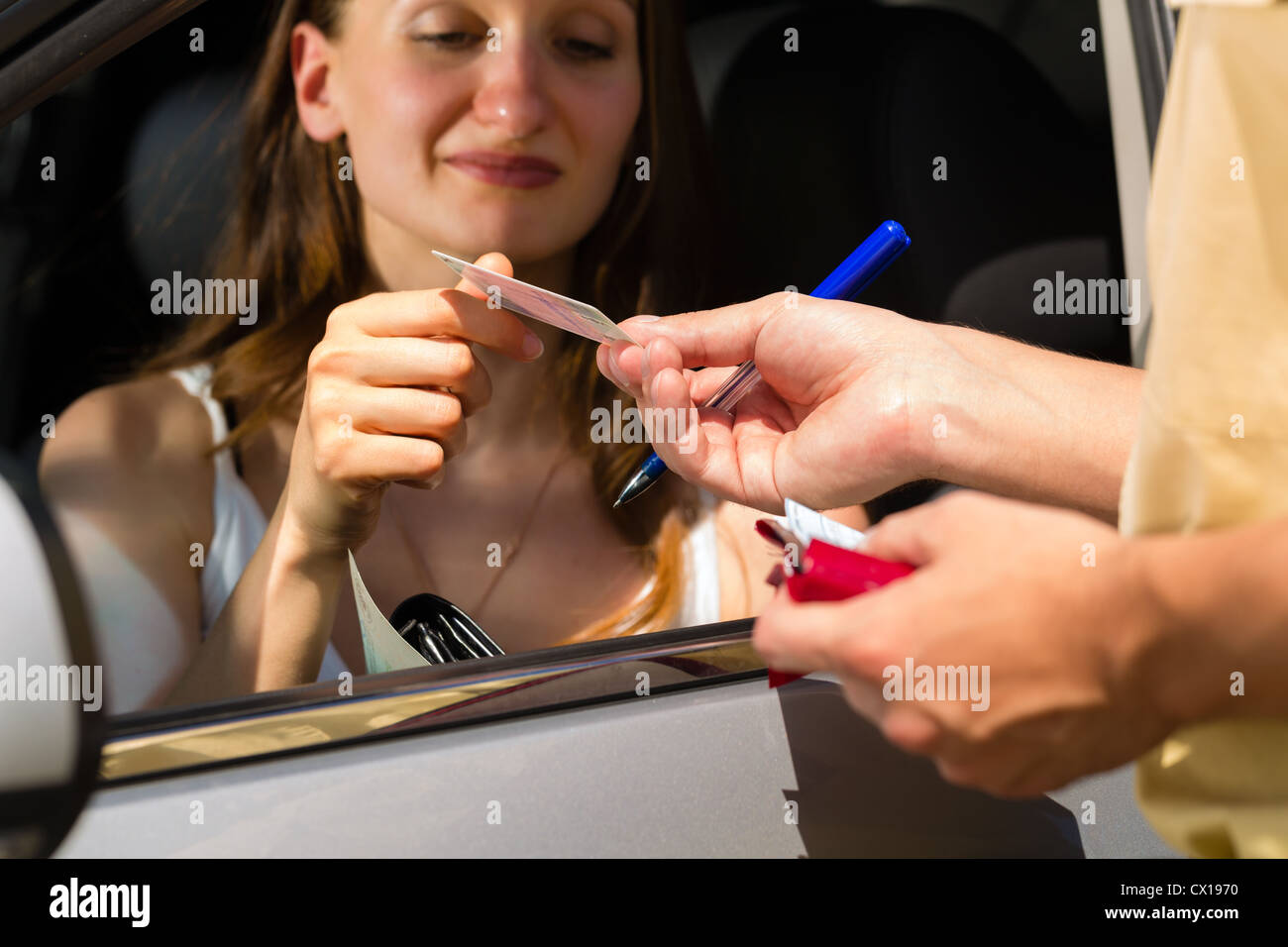 Policeman checking identification hi-res stock photography and images ...