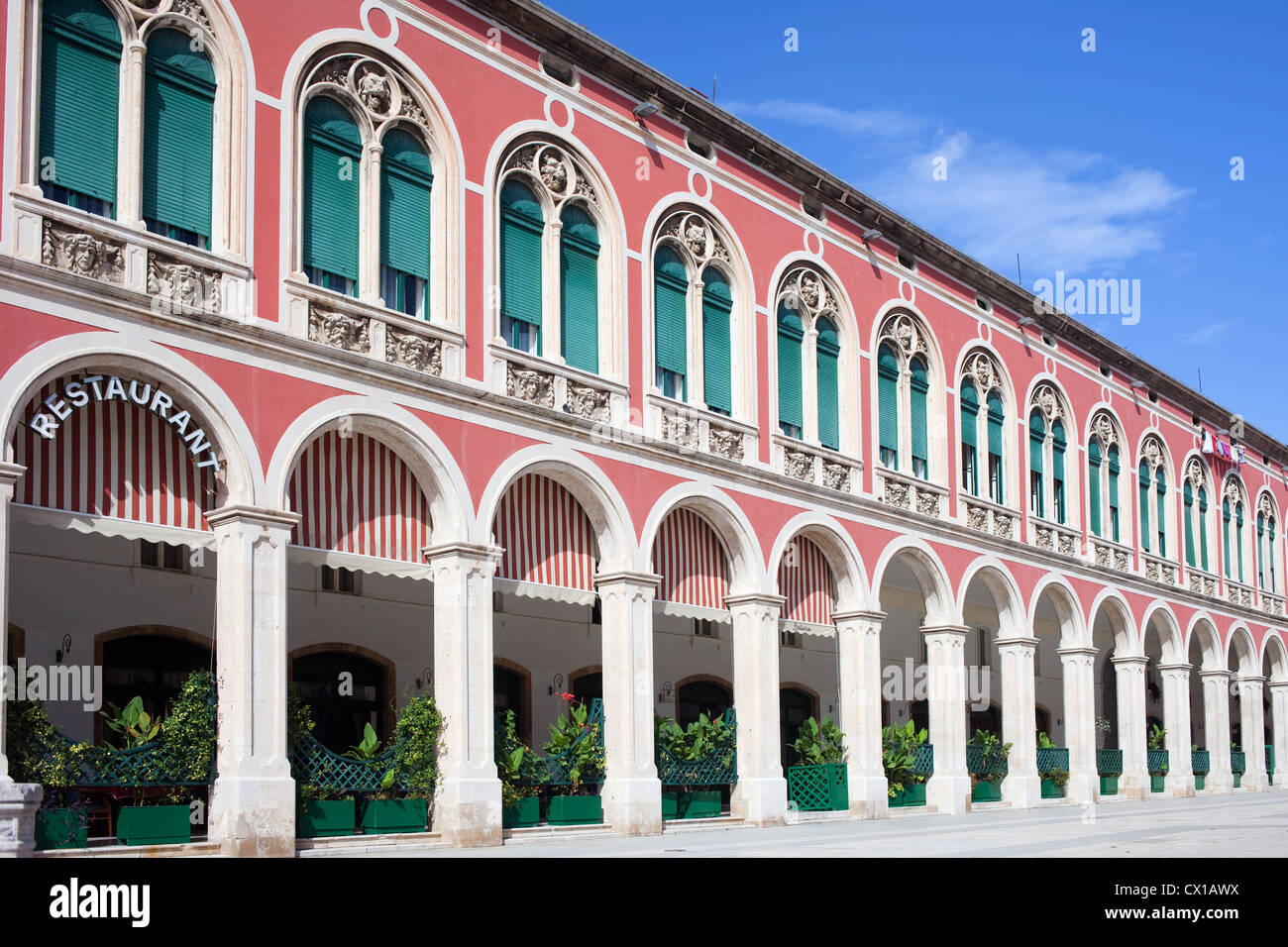 Building on the Republic Square red facade in the city of Split ...