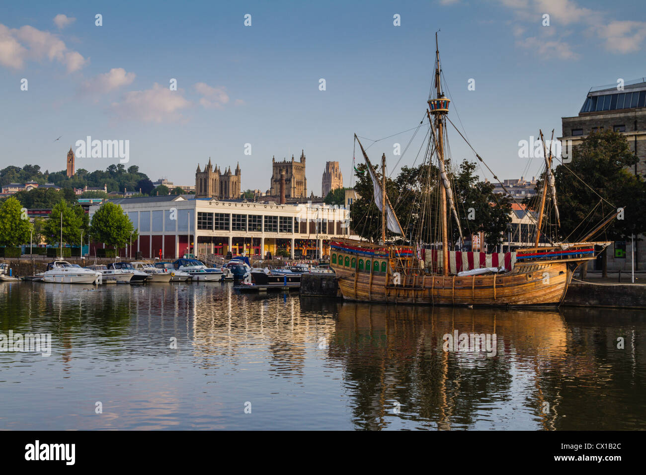 Bristol Harbour, UK with "The Matthew" ship in the foreground, sheds ...