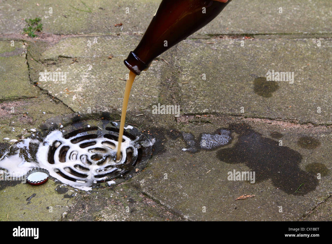 Beer poured down drain hi-res stock photography and images - Alamy