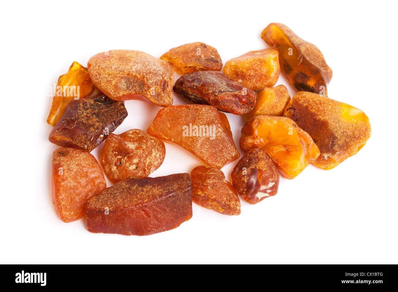 Baltic amber stone on white background Stock Photo - Alamy