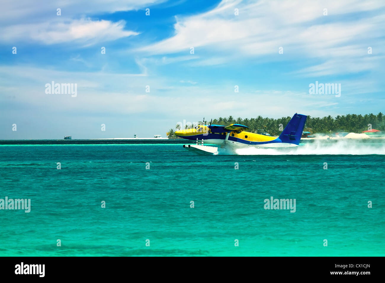 Landscape photo of Sea plane flying above ocean Stock Photo - Alamy