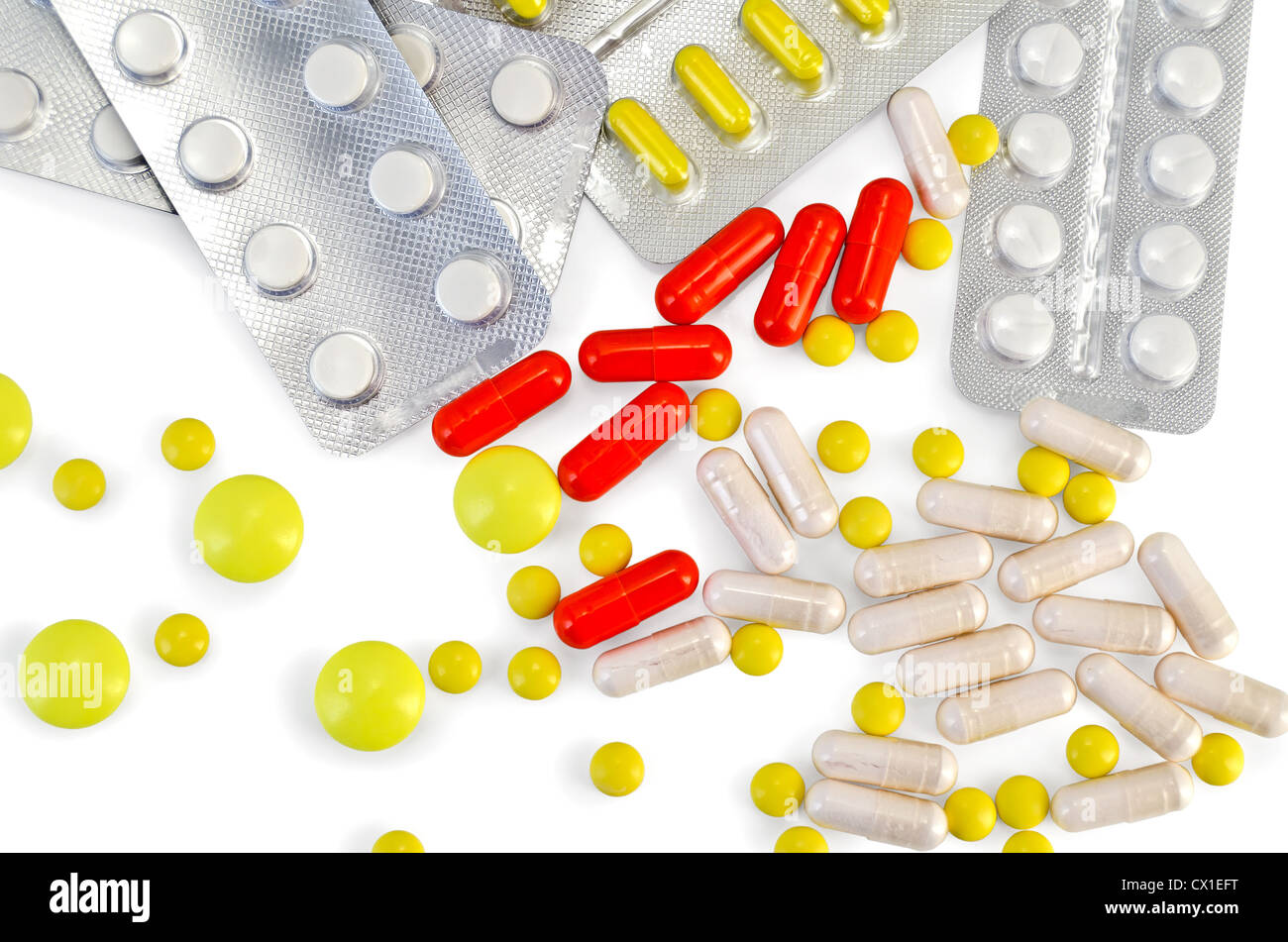 The capsules are red, yellow and pink, white pills in packages and ...