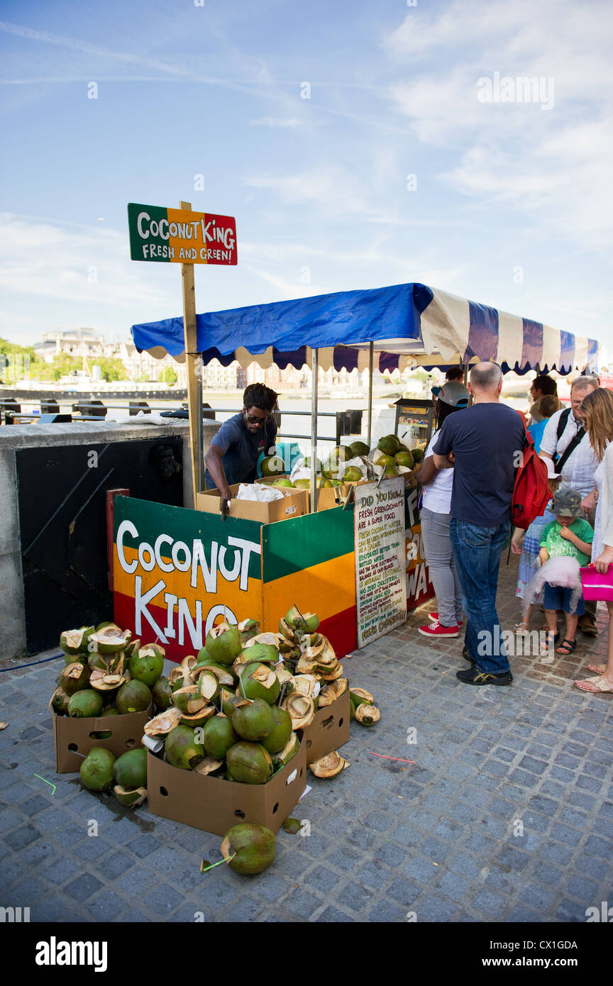 A stall selling green coconuts Stock Photo - Alamy