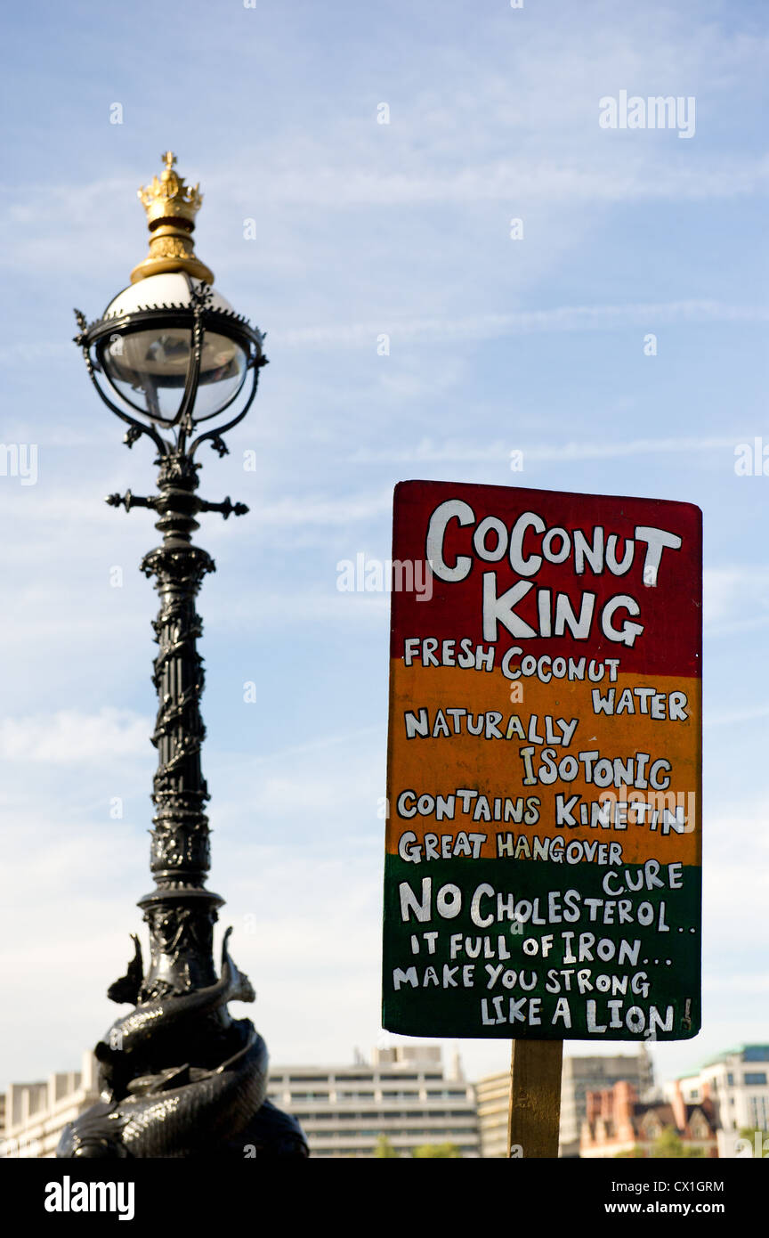 A sign advertising coconut water Stock Photo - Alamy