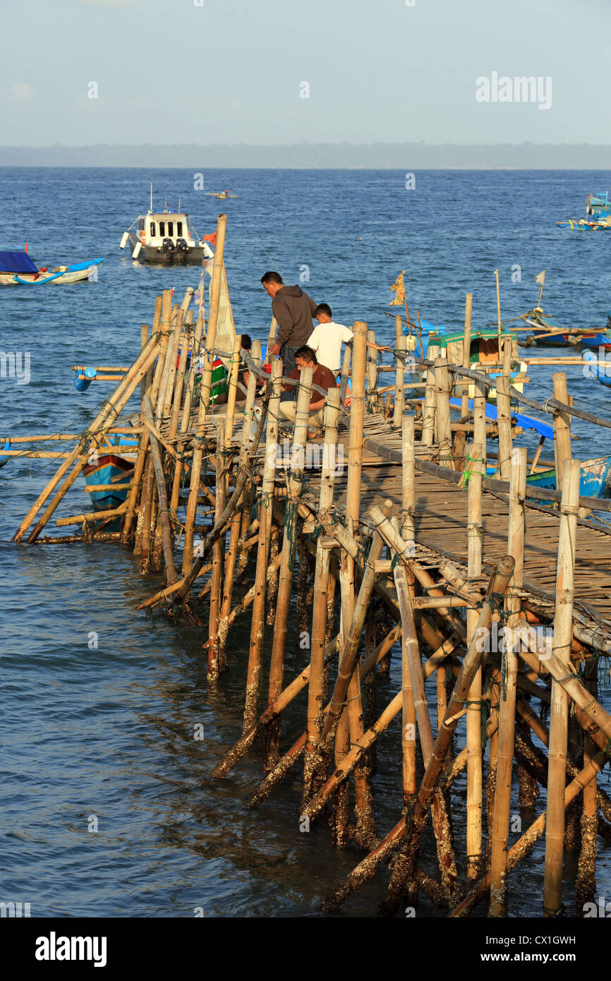 Javanese people fishing of a basic wooden jetty in Pangandaran, West ...