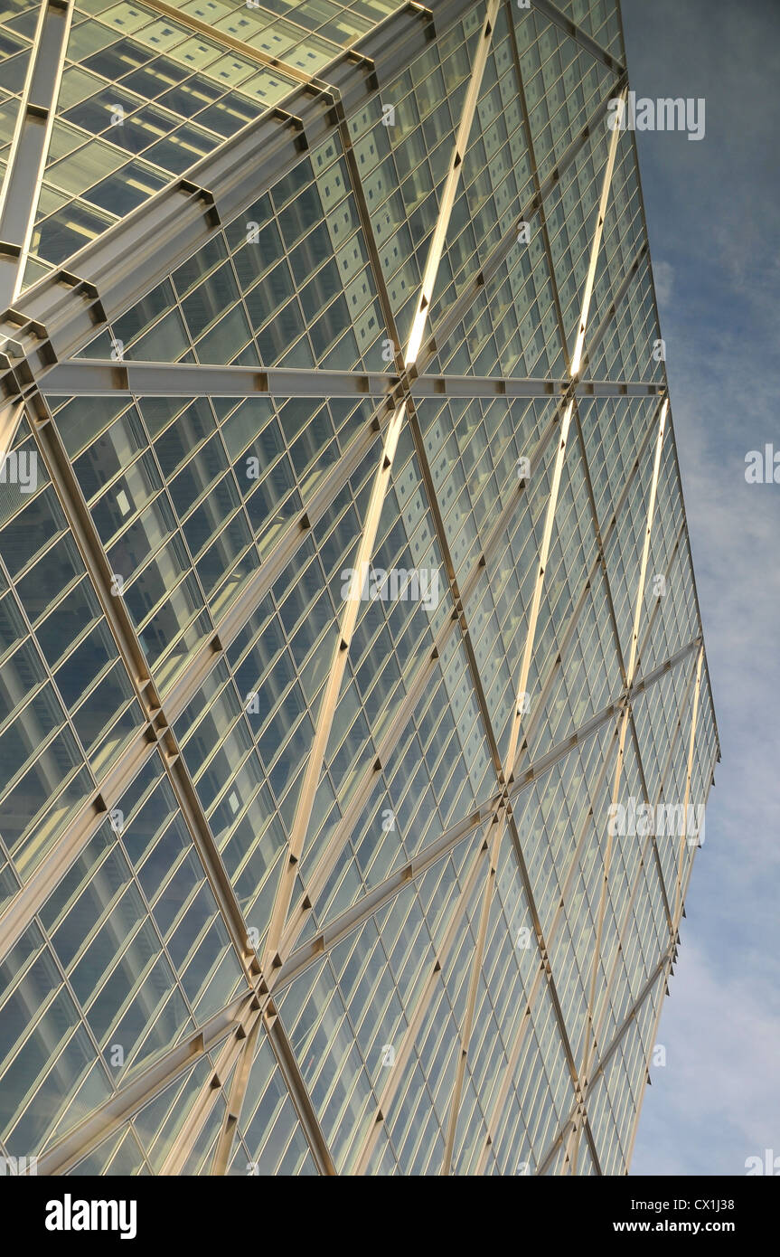 Seen from below the side of a city office building made of steel and ...