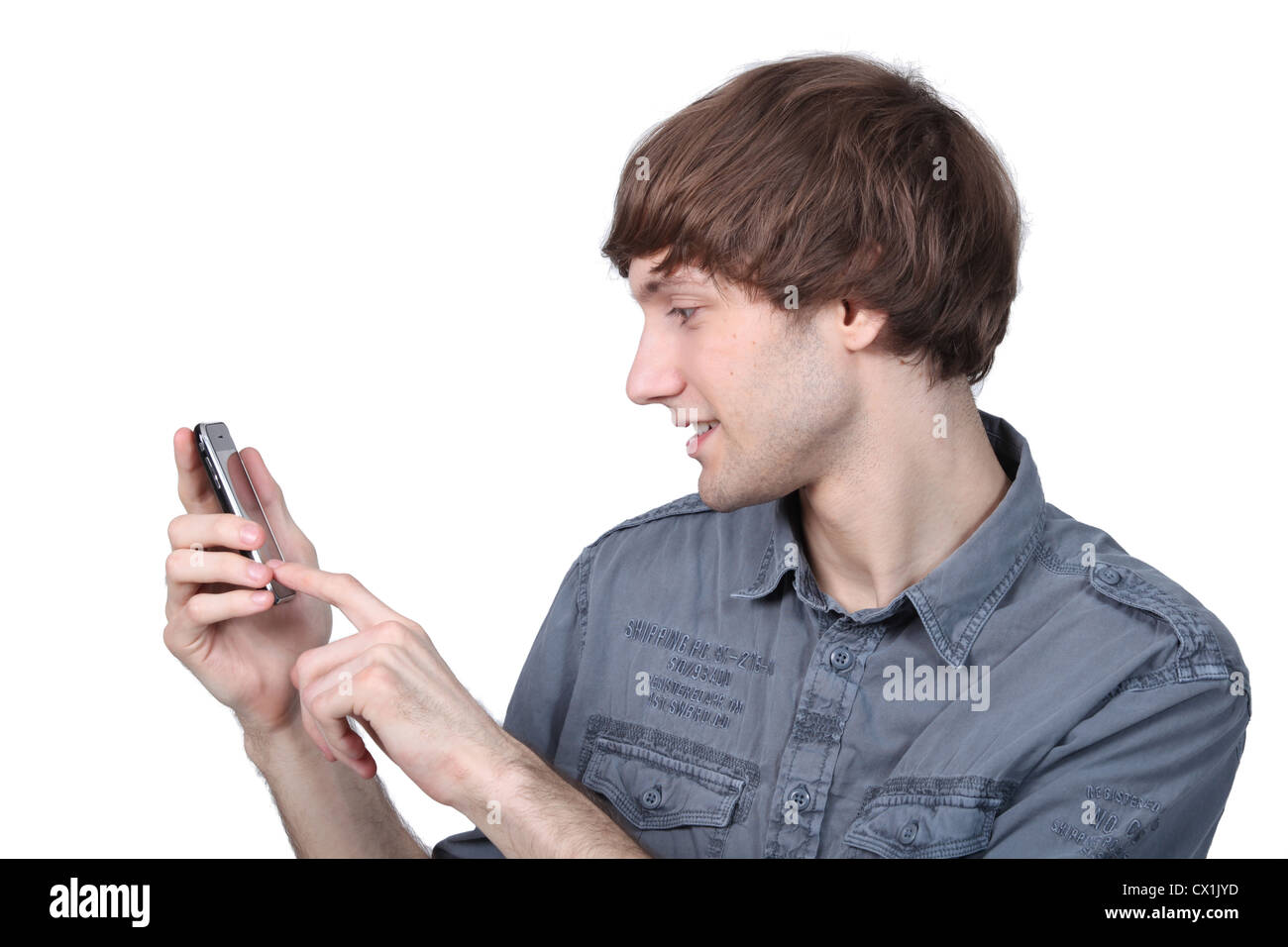 Man typing on his phone Stock Photo - Alamy