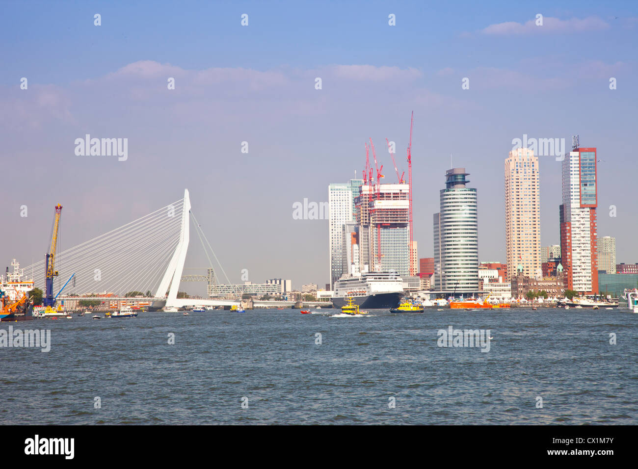 Skyline with water of Dutch city Rotterdam with buildings and bridge ...