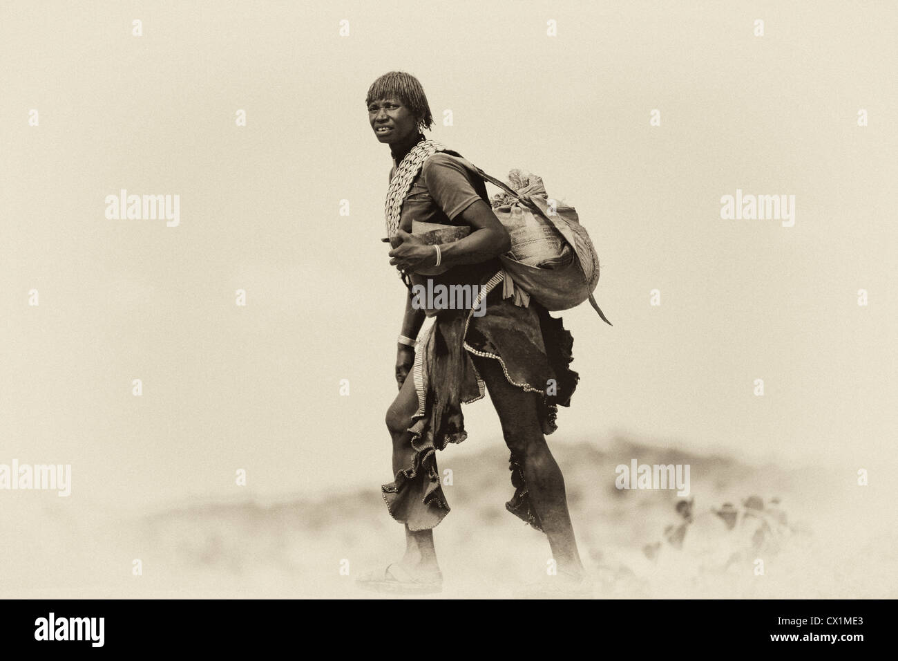 Tribal Hamar woman on her way to a market Stock Photo - Alamy