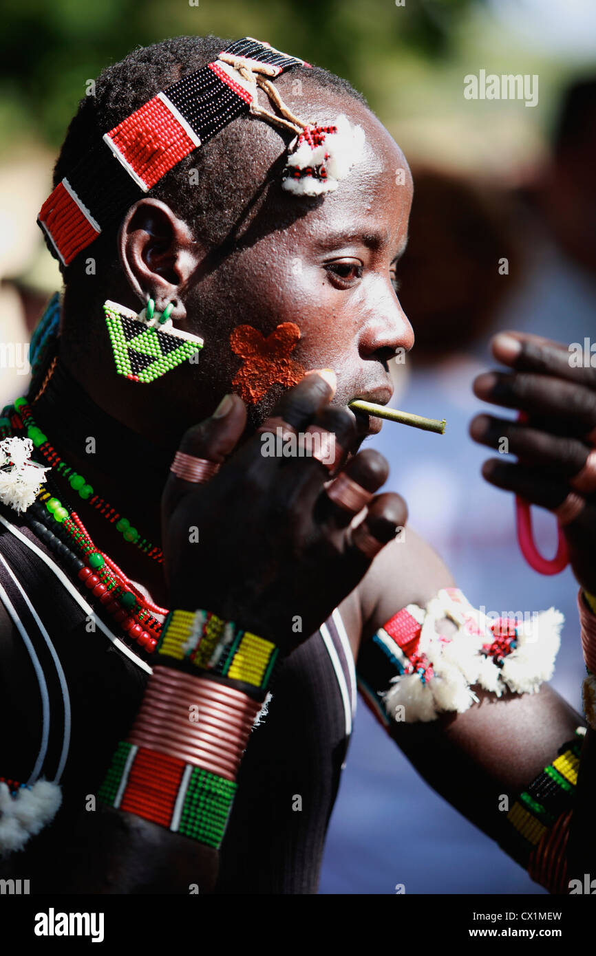 Maza painting his face in preparation for a Bull Jumping ceremony Stock ...