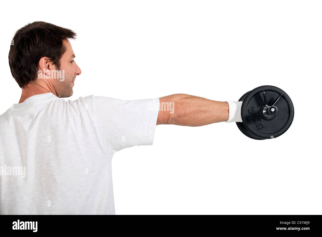 Man using hand weights Stock Photo - Alamy