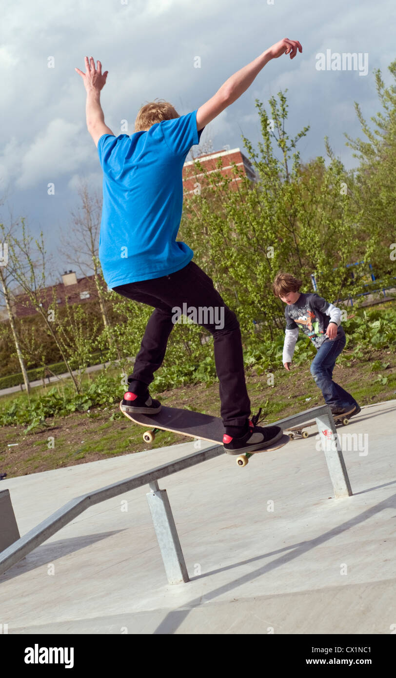 Boys skateboarding at a skateboard park Stock Photo - Alamy