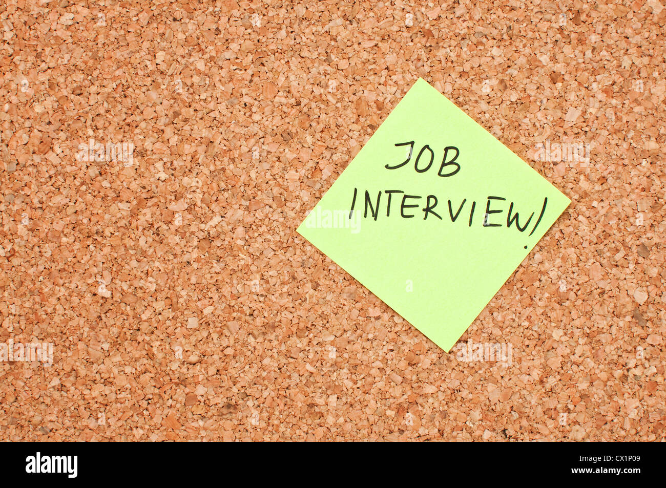 Job interview reminder note on a cork memory board Stock Photo - Alamy