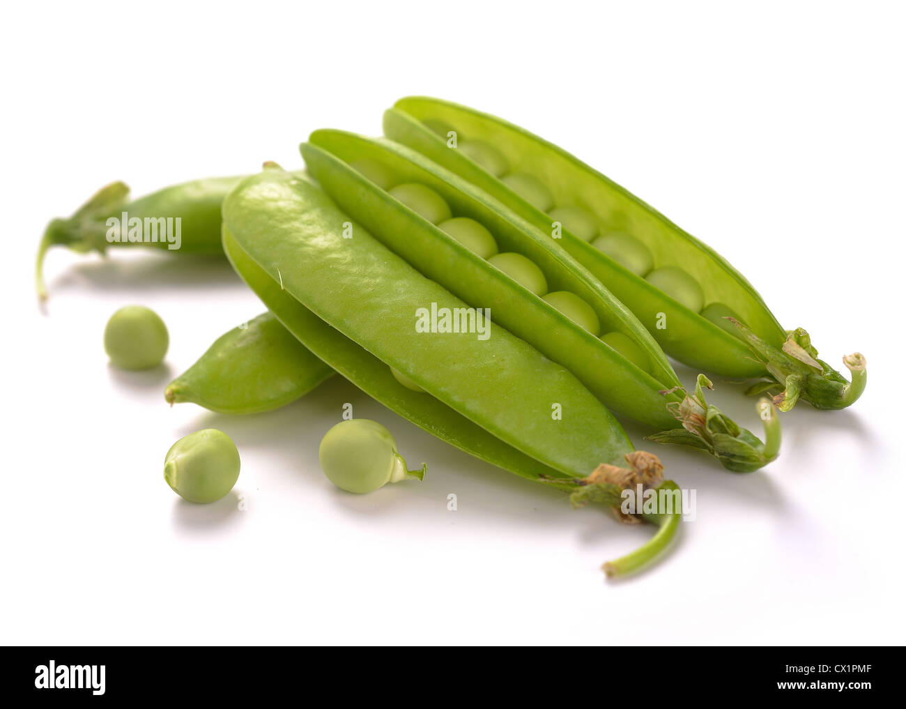 Ripe pea vegetable on white background Stock Photo - Alamy