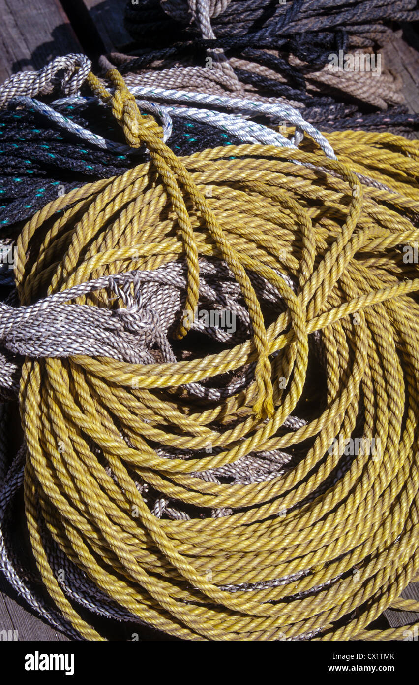 Coiled ropes on a dock in Tenants Harbor, Maine Stock Photo - Alamy