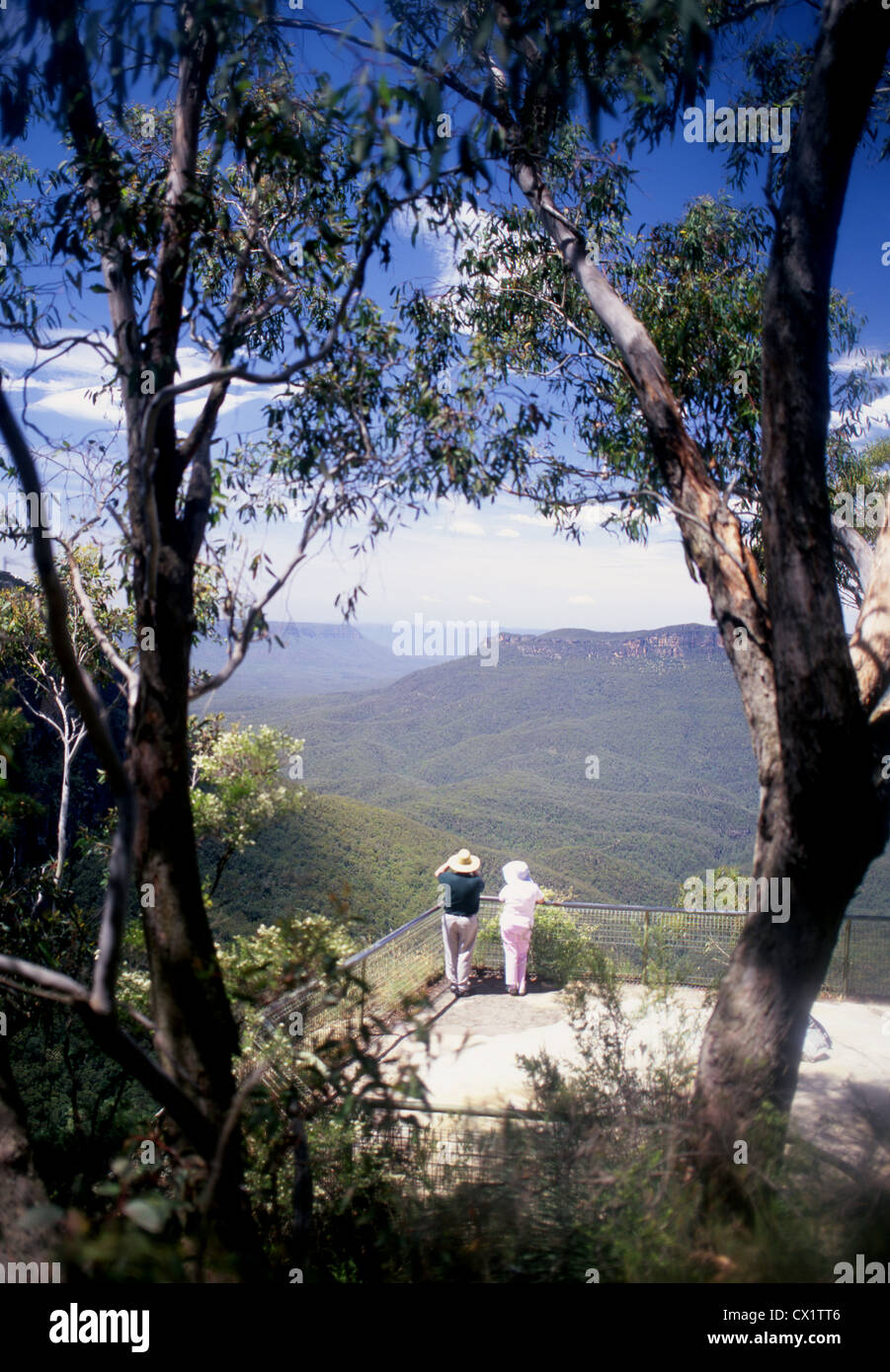 Couple in 60s looking out over Jamison Valley from Gordon Falls Lookout ...