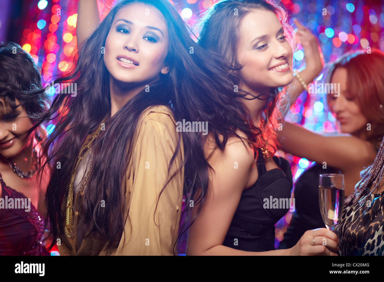 Girls having fun at club tonight Stock Photo - Alamy