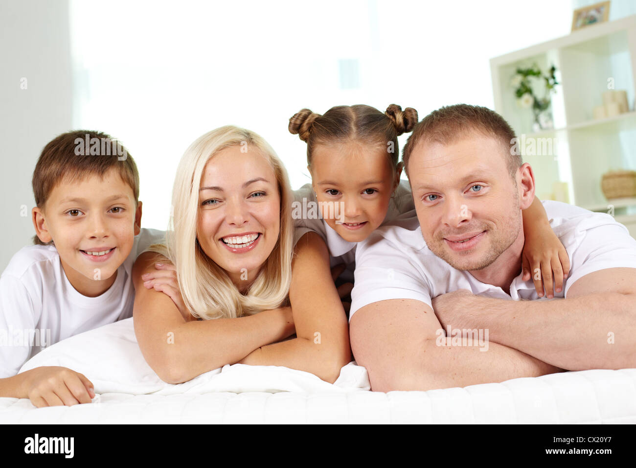 Portrait of happy children and their parents at home Stock Photo - Alamy