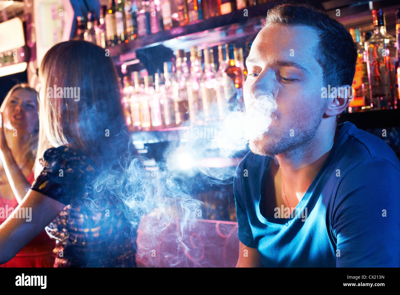 Breathing out smoke hi-res stock photography and images - Alamy