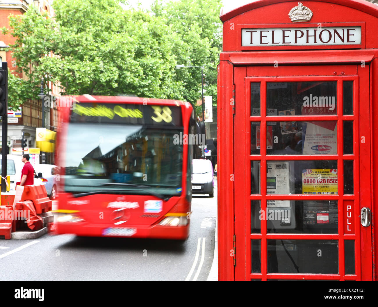 Phone Booth and Bus in London Stock Photo - Alamy