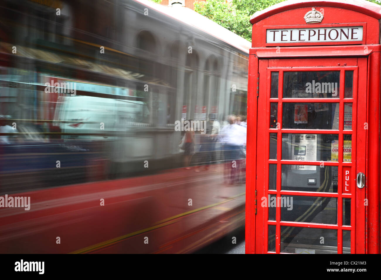 Phone Booth and Bus in London Stock Photo - Alamy