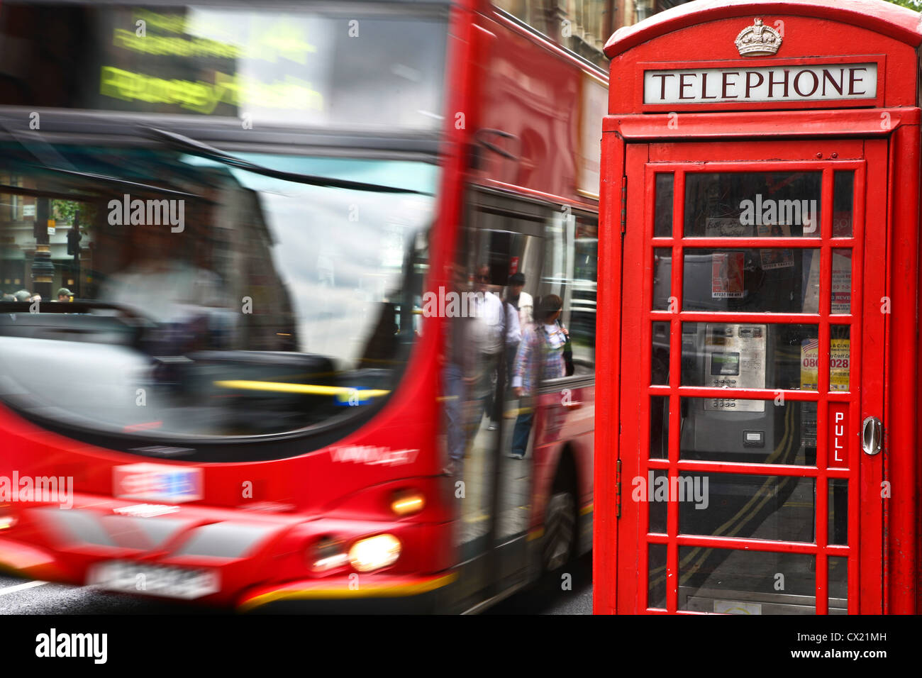 Phone Booth and Bus in London Stock Photo - Alamy