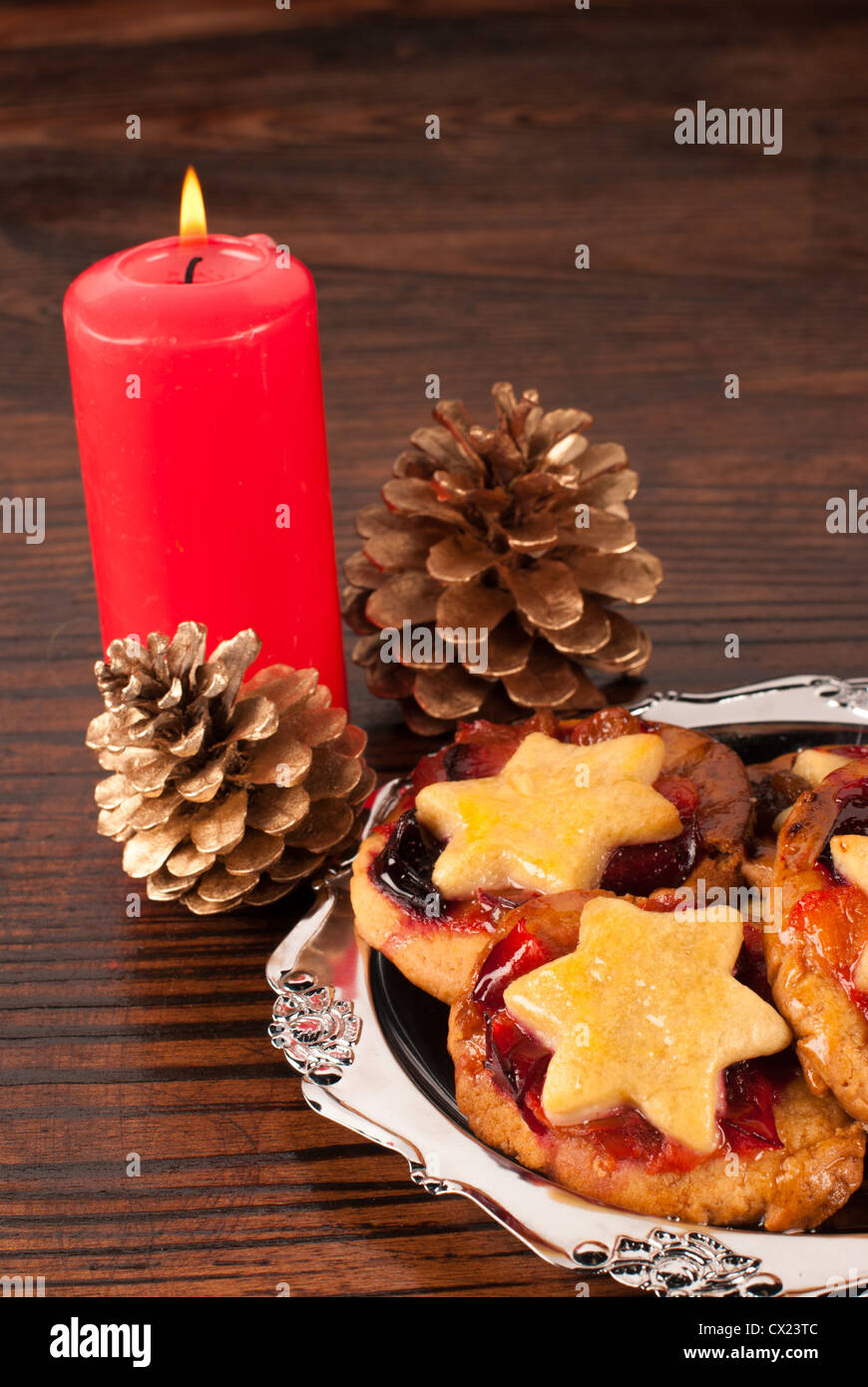 Traditional Christmas sweets with a fruity filling Stock Photo - Alamy