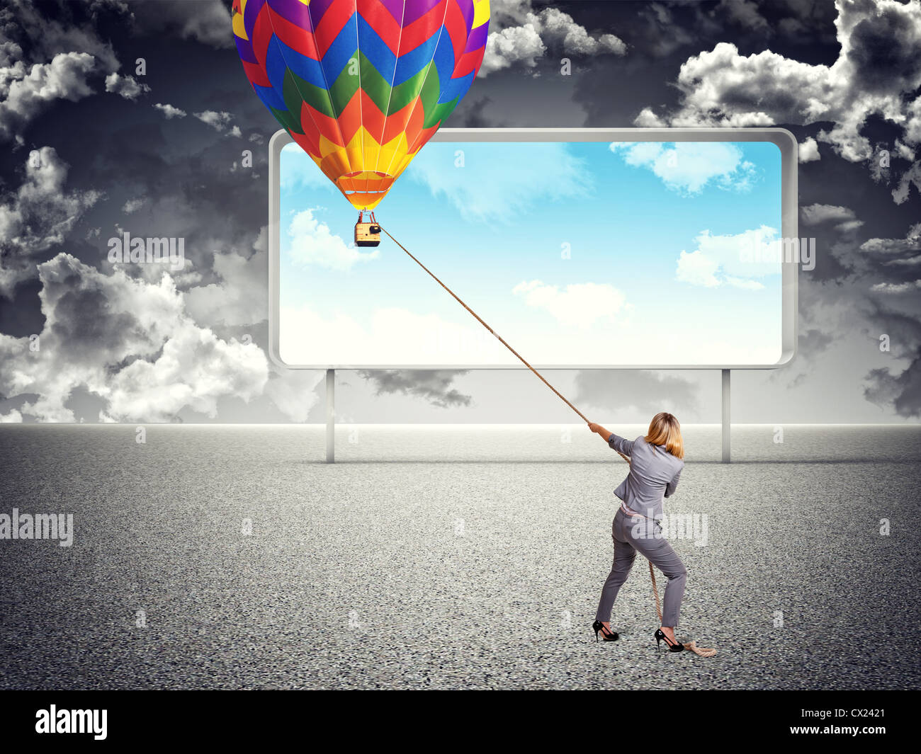 businesswoman pull hot air balloon Stock Photo - Alamy