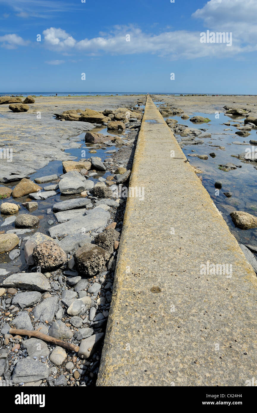 ocean beach path vanishing point whitby england uk Stock Photo - Alamy