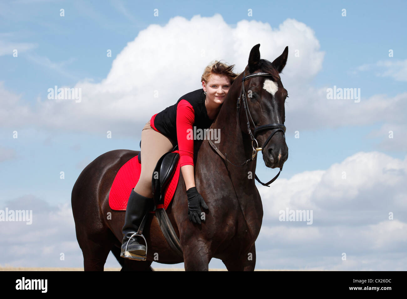 Woman riding horses hi-res stock photography and images - Alamy