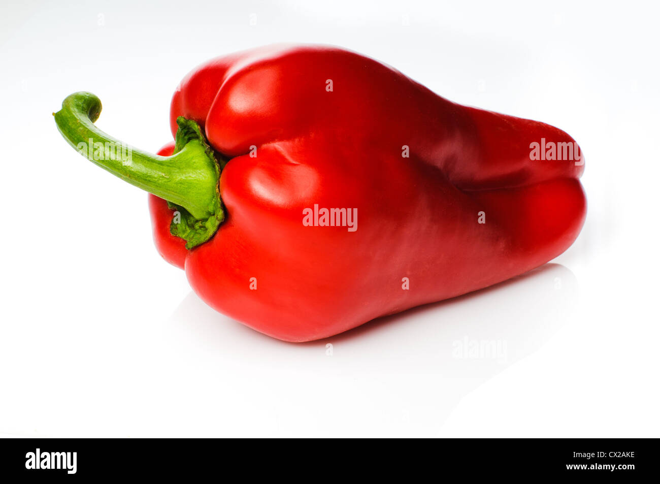 Big red pepper isolated on white background Stock Photo - Alamy
