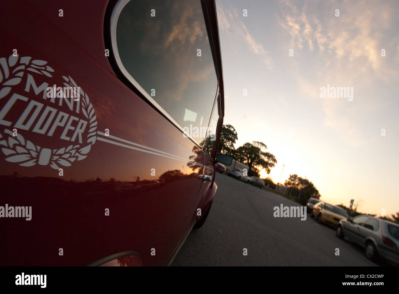 skewed image of a car at sunset looking across a carpark Stock Photo ...