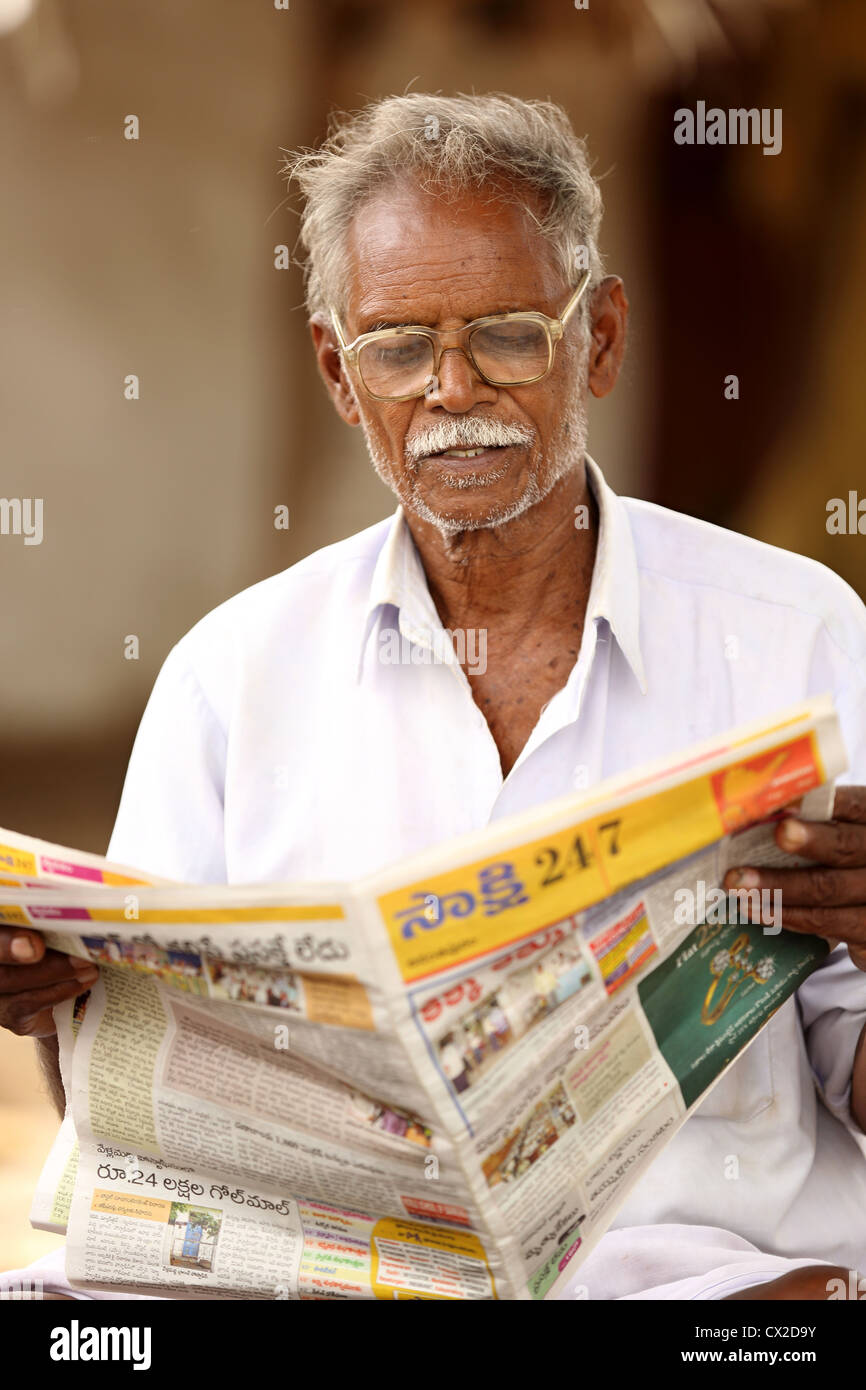 Indian man reading the newspaper Andhra Pradesh South India Stock Photo ...