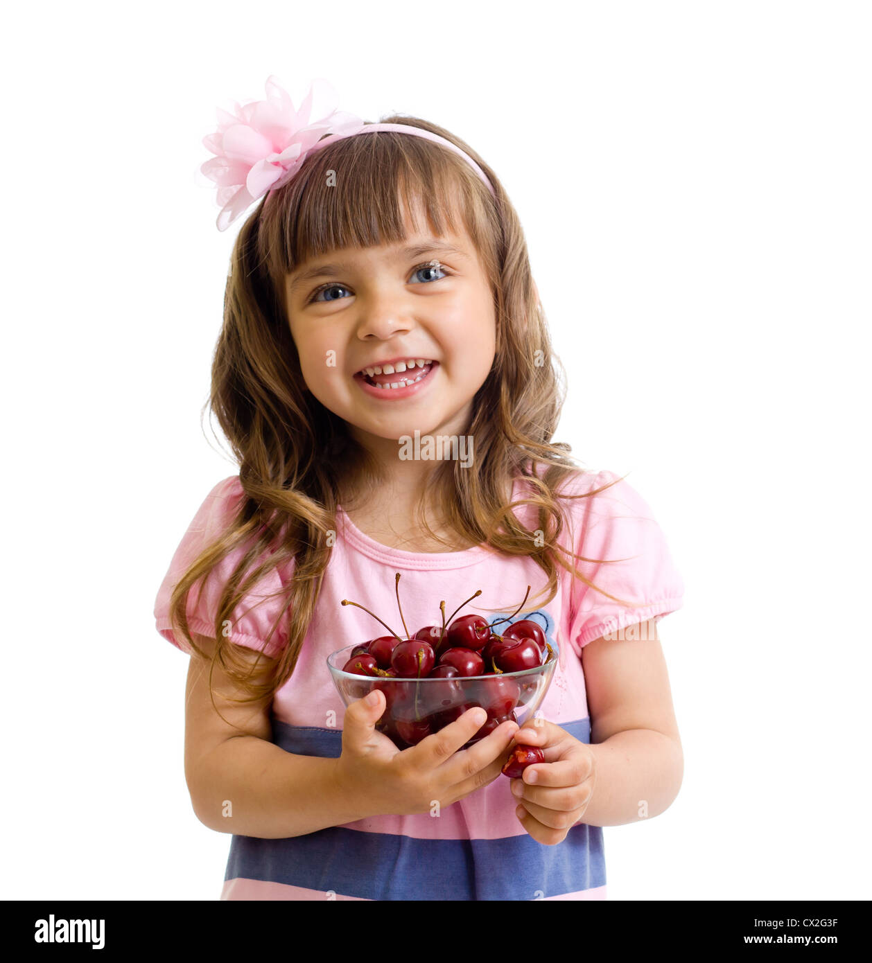 little girl with cherry berries bowl in studio isolated Stock Photo - Alamy