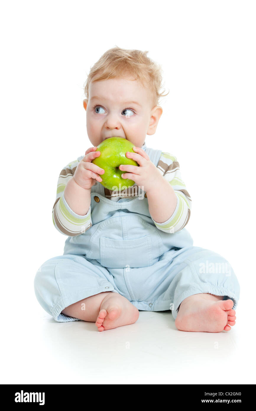 Baby boy eating healthy food isolated Stock Photo - Alamy