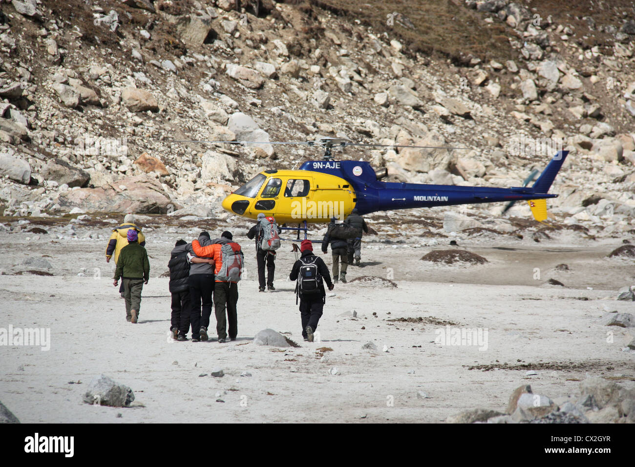 Himalayan rescue helicopter, a man carried with acute mountain sickness ...
